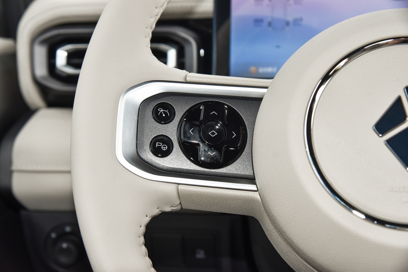 【宝骏悦也303km 智尊版左侧方向盘功能按键图片-汽车图片大全】-易车