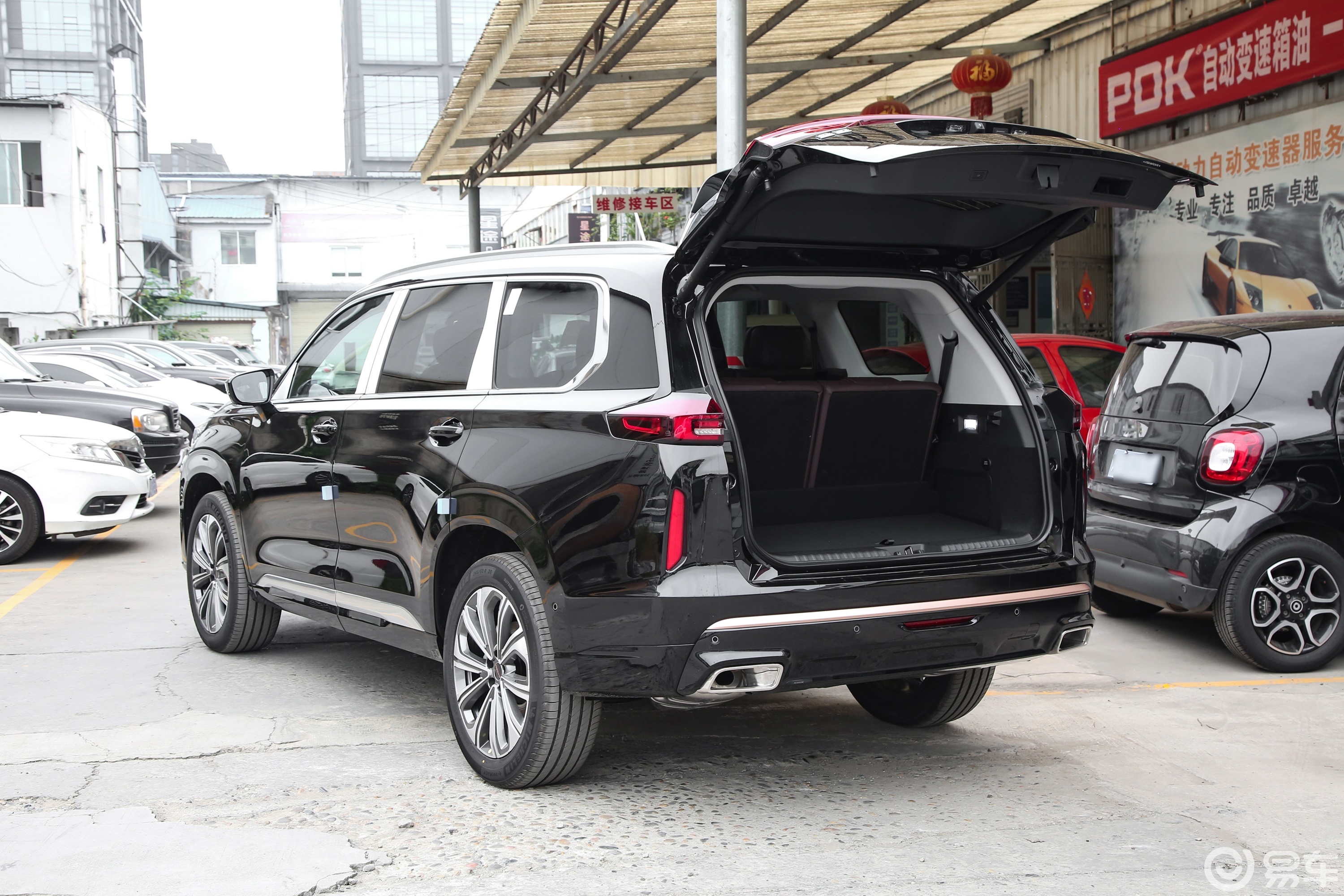 【星途揽月400T 四驱星尊版 7座后备厢开启45度侧拍图片-汽车图片大全】-易车