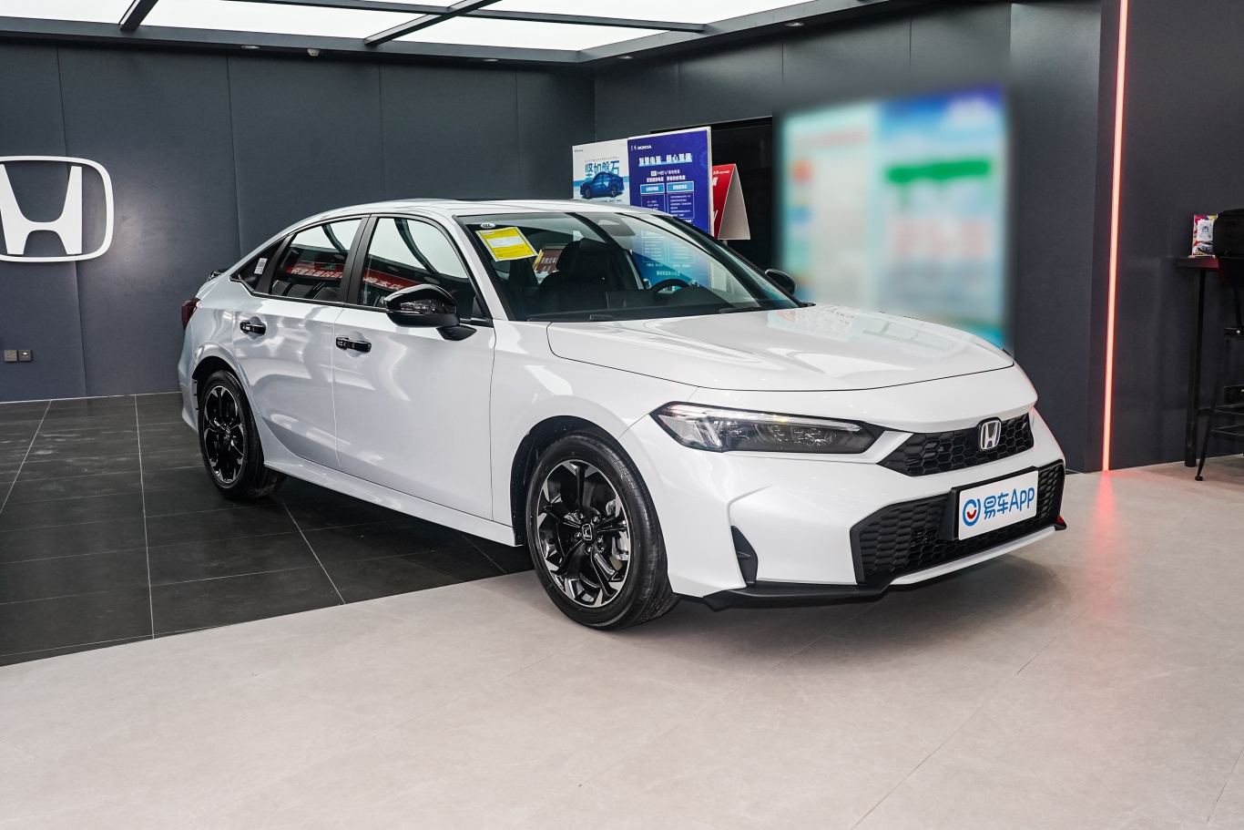 【思域e:HEV 2.0L E-CVT混动Pro侧前45度车头向右水平图片-汽车图片大全】-易车