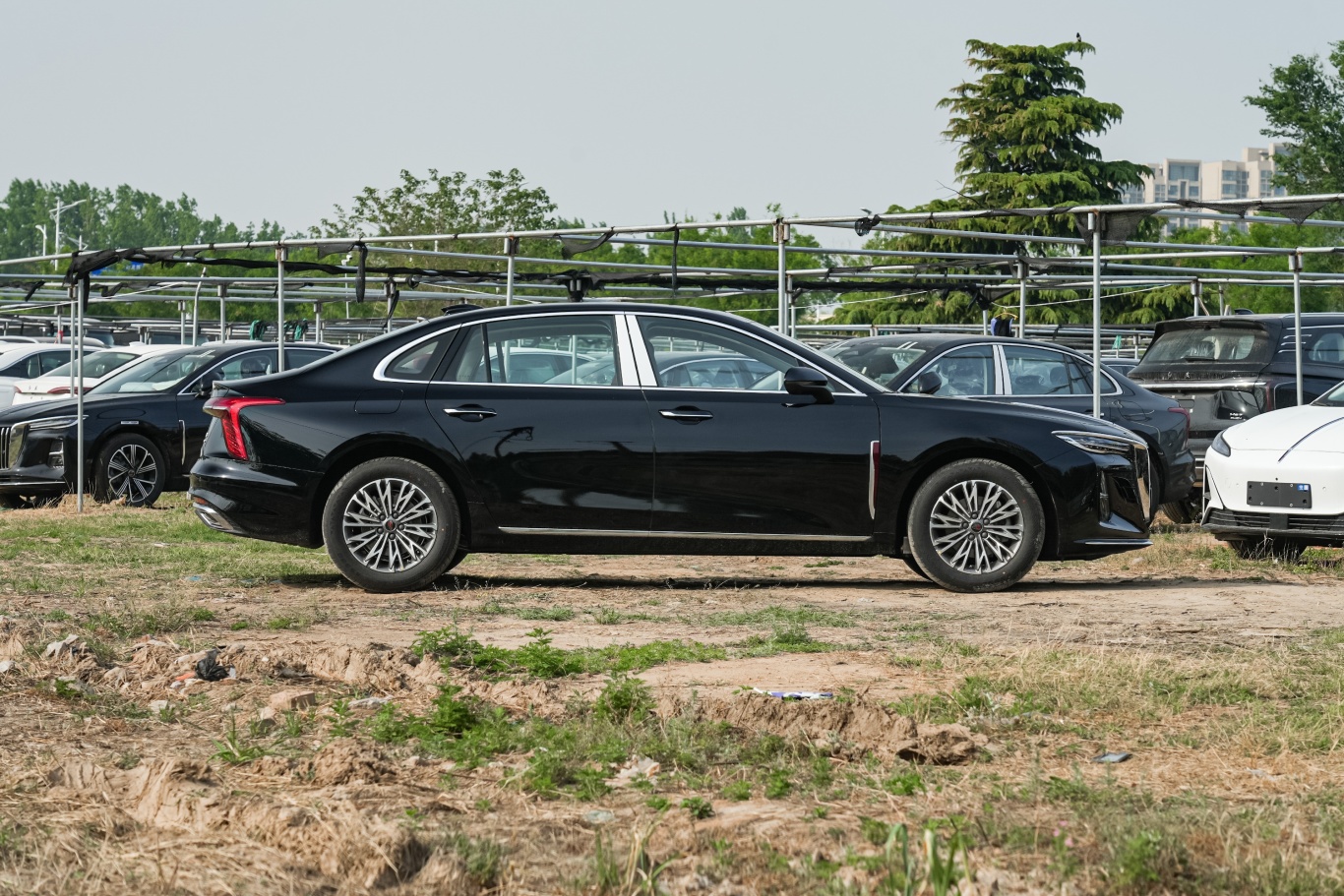 【红旗H51.5T 双离合60万辆纪念版正侧车头向右水平图片-汽车图片大全】-易车